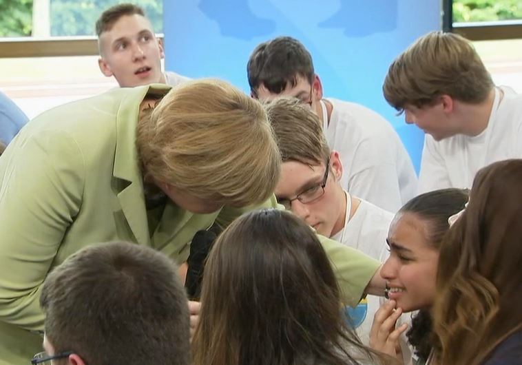 Palestinian refugee girl who cried after Merkel comments gets German ...